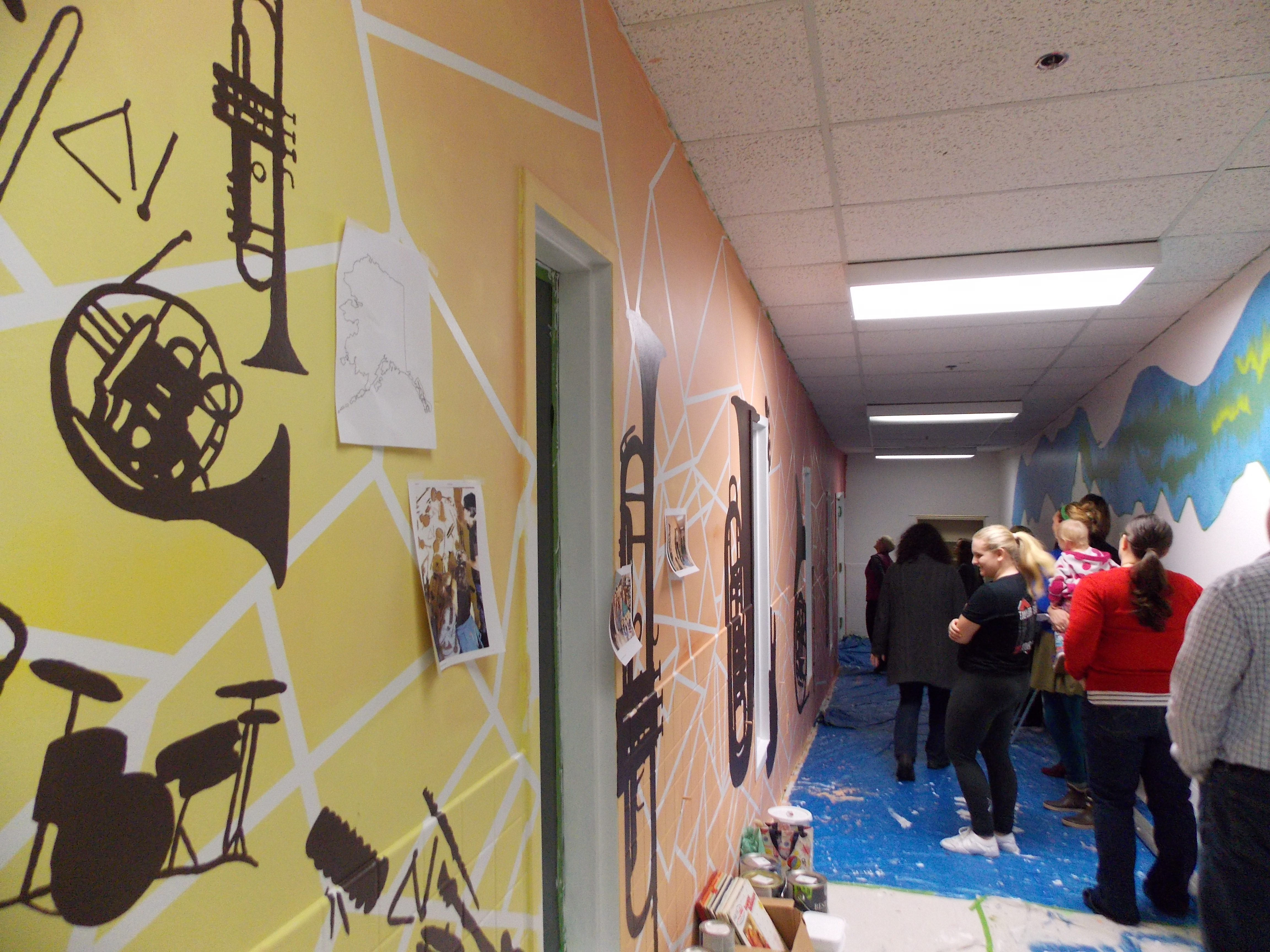 PHS students paint new mural outside band room - KFSK